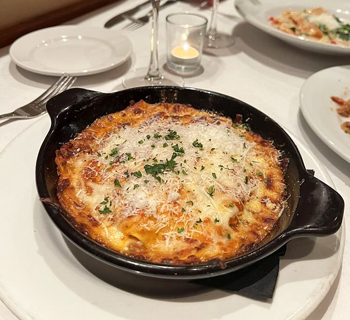 That bubbling lasagna bolognese in cast iron proves some traditions never need improving, just perfecting.