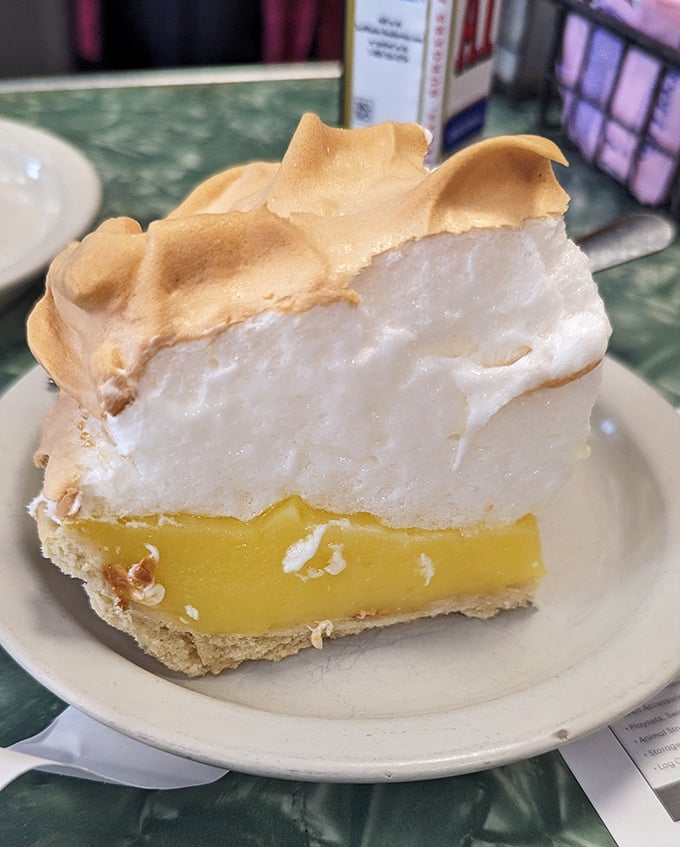 The lemon meringue pie's towering white peaks and sunshine-yellow filling create the dessert equivalent of a standing ovation. Worth every calorie.