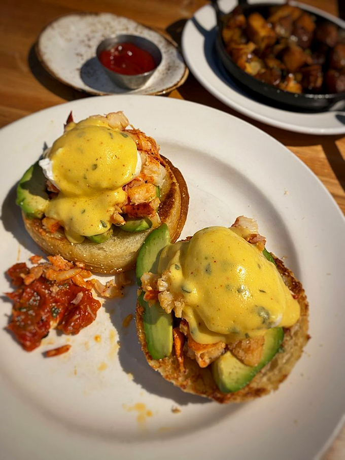 Eggs Benedict gets the coastal treatment with lobster and avocado—breakfast's way of saying "you deserve nice things today."