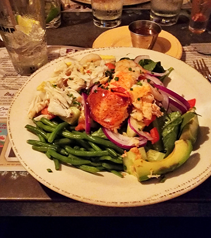 The legendary Lobster Cobb Salad – where "eating your vegetables" suddenly becomes the highlight of your week rather than a chore.