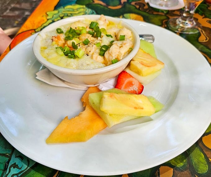 Lobster and grits with fresh fruit—the breakfast equivalent of wearing a tuxedo with flip-flops. Somehow, it works brilliantly in Key West.