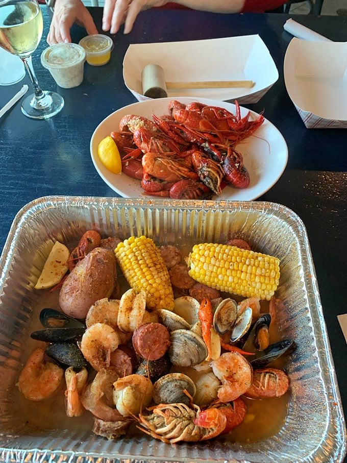 The Low Country Boil arrives like a seafood fever dream—crawfish, shrimp, sausage, and corn having the world's most delicious pool party in your honor.