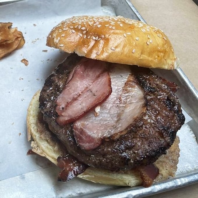 The Macon isn't just a burger—it's a pork pilgrimage. When bacon, ham, and beef join forces, resistance becomes both futile and foolish.