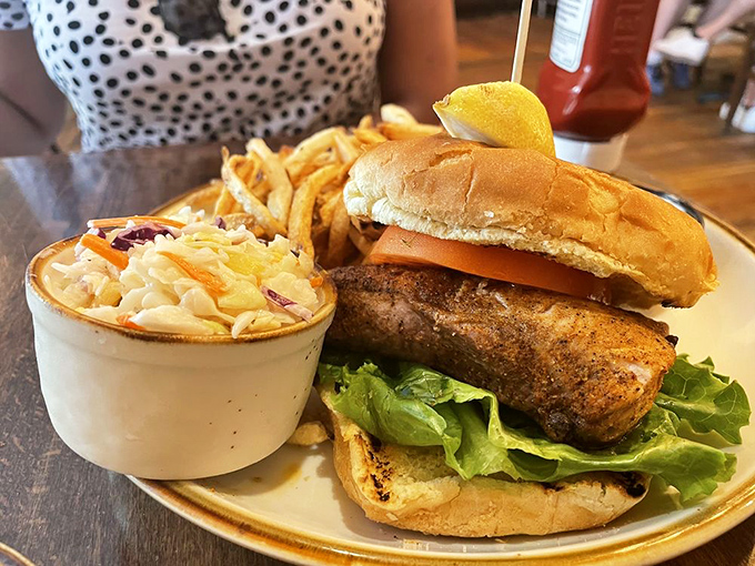 A sandwich should be judged by how many napkins it requires. This mahi-mahi masterpiece demands at least three, and every messy bite is worth it.