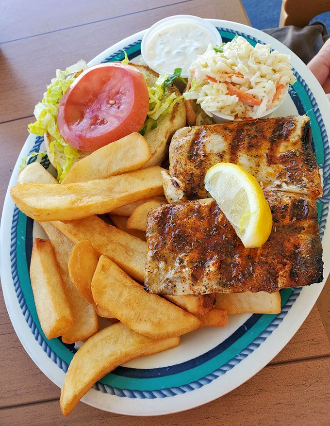 Grilled fish, coleslaw, and thick-cut fries—this classic coastal combo brings the taste of Florida straight to your plate. No passport needed for this flavor getaway.