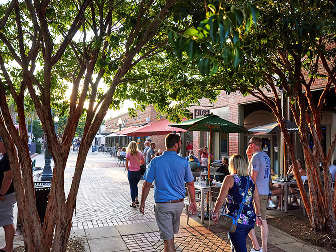 The Alley in downtown Aiken transforms from shopping destination to social hub as afternoon slides into evening—no bowling required.