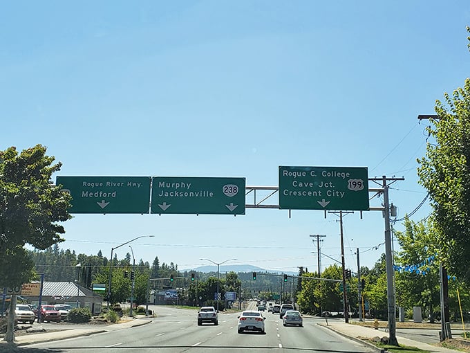 Road signs pointing to adventure in every direction. In Grants Pass, even the detours lead somewhere interesting.