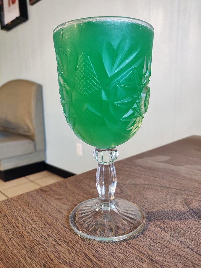 That green goblet of mystery promises either enlightenment or a really good time before noon.