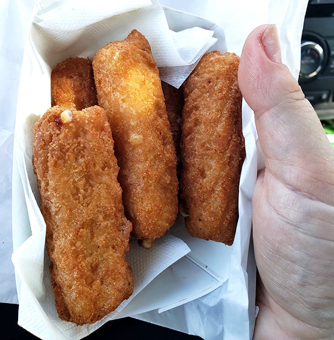 Cheese sticks that achieve that mythical balance—crispy exterior giving way to that perfect cheese pull that deserves its own slow-motion sequence.