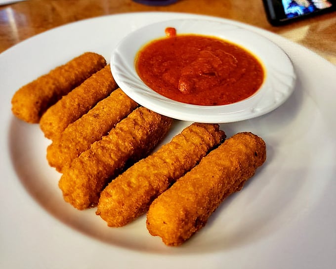 Mozzarella sticks: The universal language of "yes, you deserve this today." Crispy exterior, molten interior, marinara perfection.
