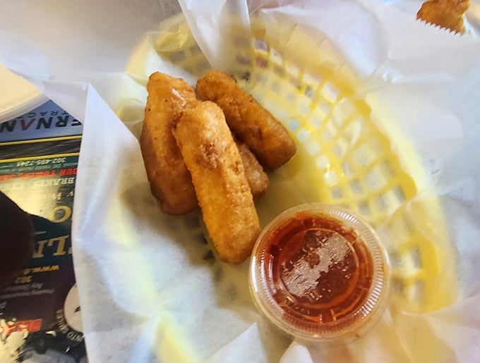 Golden-fried mozzarella sticks: crunchy on the outside, stretchy and gooey within—the kind that make that perfect cheese pull for your food fantasies.