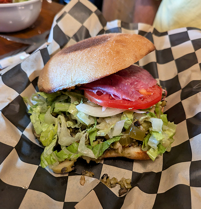 This sandwich doesn't just satisfy hunger—it eliminates it completely. Layers of goodness nestled between bread that's achieved the perfect crisp-to-soft ratio.