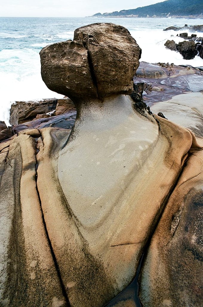 This sandstone formation looks like what would happen if Salvador Dalí designed a rock garden after eating too many mushrooms.