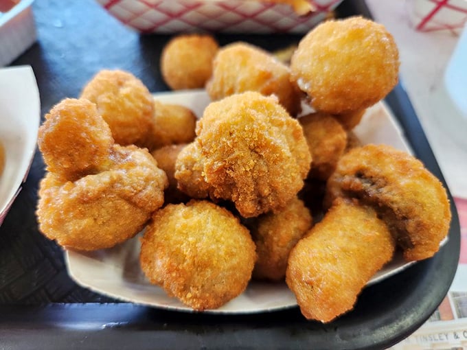 These golden mushrooms aren't trying to be truffle-infused or panko-crusted—they're just being their best, unpretentious, deliciously fried selves.