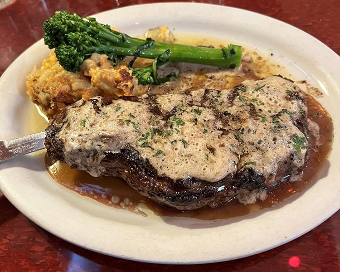 7. ny strip steaThe NY Strip at Bonge's doesn't need fancy plating—it commands respect through perfect execution. That melting compound butter is performing a slow, delicious dance.k