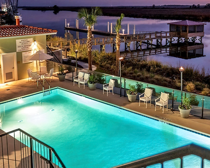 When day turns to dusk, Darien's waterfront accommodations offer pools with a view – proving small towns can deliver big luxury when nature provides the backdrop.