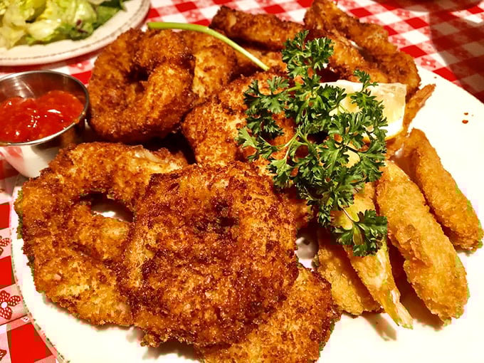 These aren't just onion rings—they're golden halos of crispy perfection that make you question why you'd ever eat vegetables any other way.