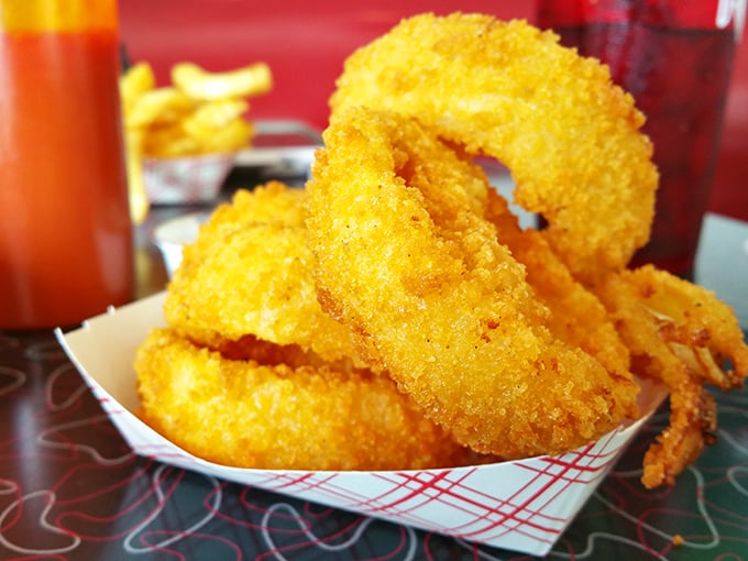 The star attraction! These onion rings aren't just fried food—they're golden halos of crispy perfection that make you believe in culinary miracles.