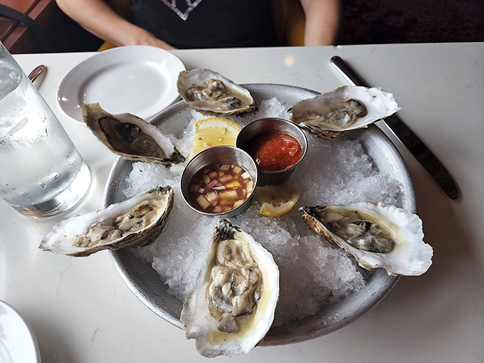 Oysters on ice—nature's perfect appetizer. These briny treasures come with mignonette that makes you want to high-five the chef. The ocean's finest calling card.