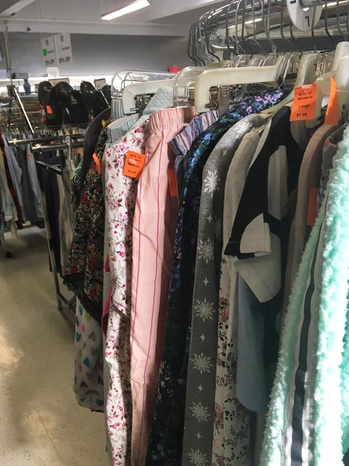 Racks of possibility! Each hanger holds not just clothing but potential new identities waiting to be adopted.