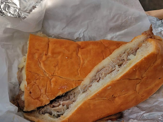This sandwich cross-section reveals the beautiful stratification of flavors—like delicious geological layers of a culinary Grand Canyon.