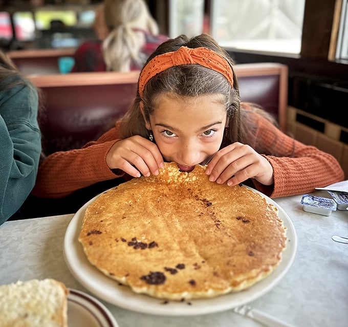 When pancakes are bigger than your face, you know you're in the right place. This golden disc of breakfast joy could feed a family—or one very determined diner.