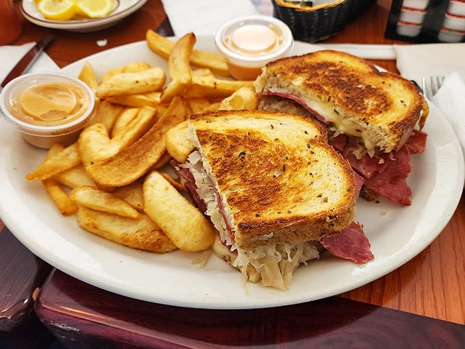 The Reuben sandwich—where sauerkraut, corned beef and Swiss cheese hold their delicious summit meeting on perfectly grilled rye.