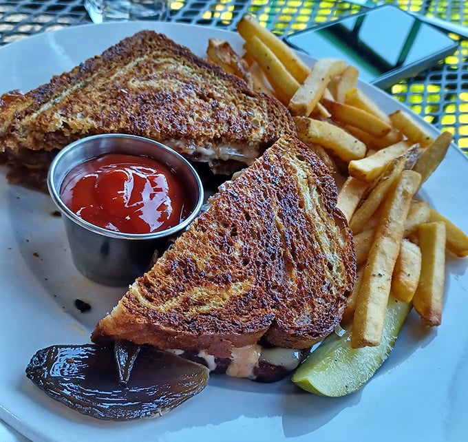Not your diner's patty melt. This golden-grilled sandwich with perfectly melted cheese proves that sometimes the classics deserve the gourmet treatment.