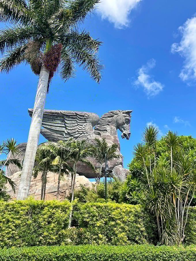 Majestic wings spread against tropical palms—where else but Florida would ancient Greek mythology feel so perfectly at home?