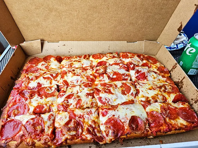 Pepperoni pizza perfection in its natural habitat—a cardboard box. Simple, unpretentious, and exactly what your taste buds have been craving.