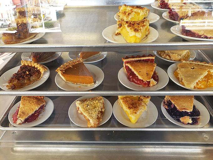 The pie case at Wilson's is like a museum of Americana – each slice a masterpiece of fruit, crust, and the kind of baking wisdom that can't be taught in culinary school.