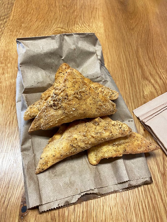 These golden triangles aren't just pimento cheese dumplings—they're little pockets of Southern comfort reimagined for the Midwest palate.