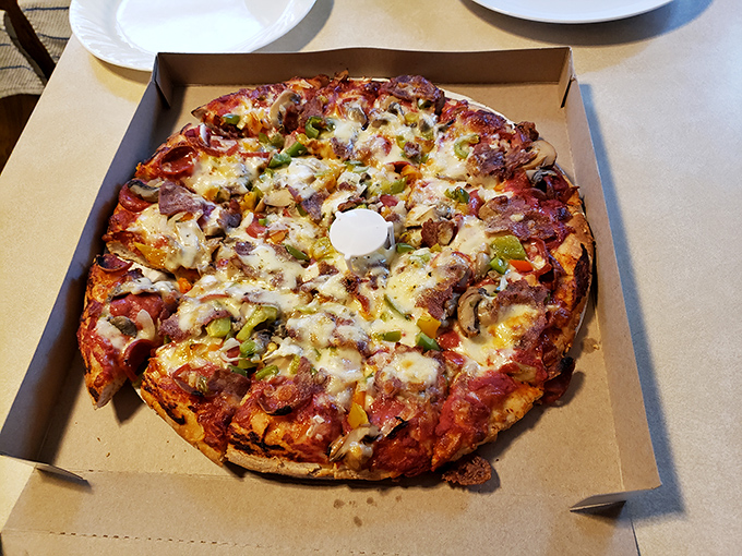 Pizza perfection doesn't need fancy toppings or artisanal pretense—just the holy trinity of great crust, vibrant sauce, and cheese that means business.