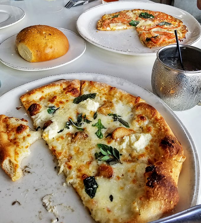 Pizza perfection with pillowy edges and just the right cheese-to-basil ratio—proof that simplicity, when done right, is anything but simple.