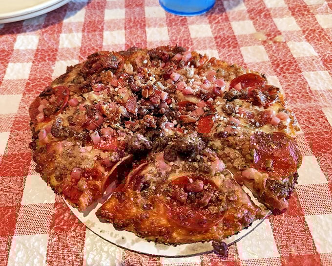 This isn't just pizza—it's a meat lover's manifesto in circular form. The kind of pie that makes you cancel your evening plans.