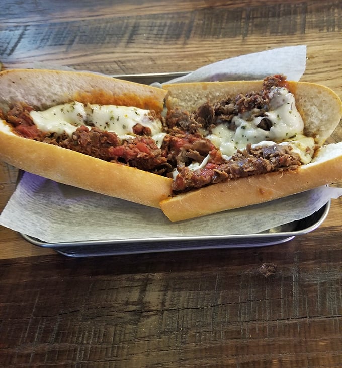 The legendary pizza cheesesteak—where two Pennsylvania icons meet in a sandwich that should have its own state holiday.