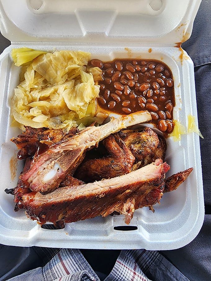 The classic BBQ combo plate: where decisions are hard but regrets are impossible. Those beans and greens aren't just sides—they're essential supporting characters.