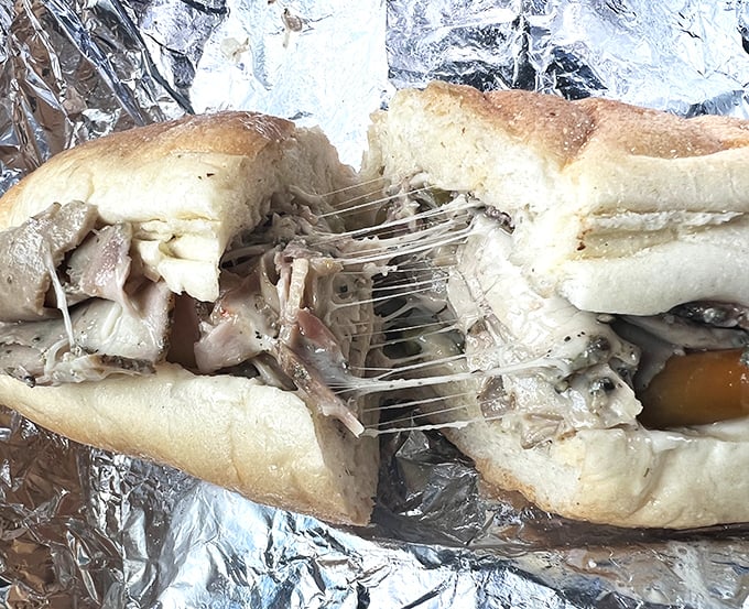 The porketta hoagie: where tender meat meets crusty bread in a sandwich symphony. This isn't lunch—it's an edible hug from an Italian grandmother.