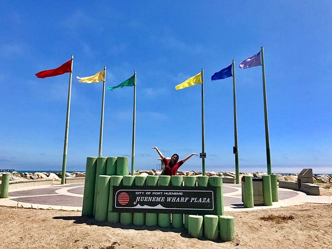 The colorful flags at Hueneme Wharf Plaza flutter like a permanent celebration. A perfect spot for that "I'm on vacation" pose that makes your friends back home quietly jealous.