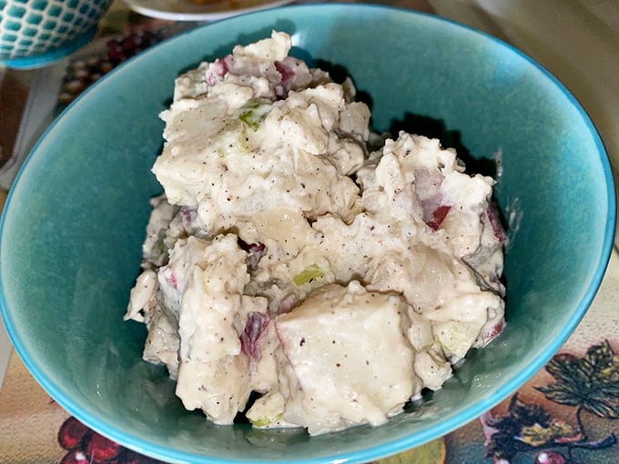 This isn't your aunt's bland potato salad from the family reunion—this is the potato salad that makes you rethink your relationship with spuds.