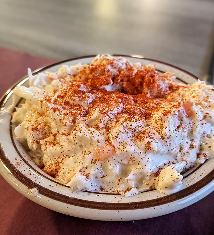 This isn't just potato salad—it's a masterclass in comfort. The paprika sprinkle isn't just garnish; it's the exclamation point on a classic.