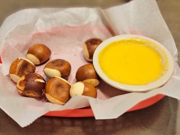 Pretzel bites with cheese sauce – the appetizer equivalent of a perfect opening act that threatens to steal the whole show.