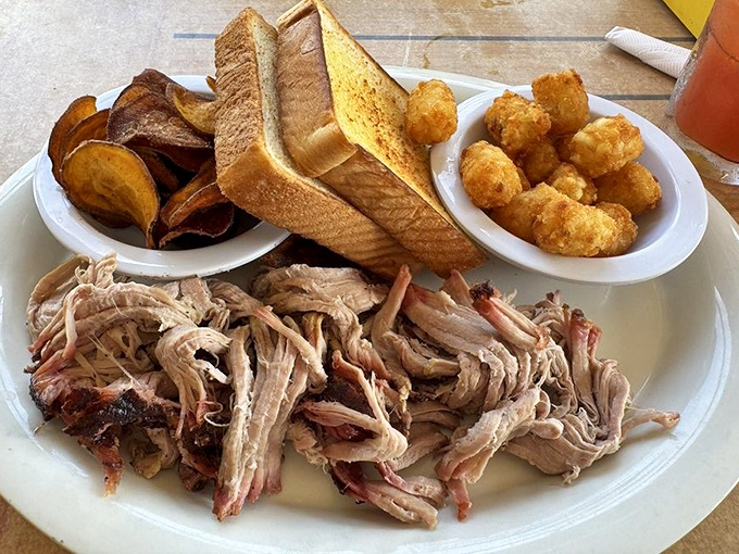 Pulled pork so tender it practically pulled itself. Served with Texas toast, corn nuggets and sweet potato chips—a holy trinity of Southern comfort.