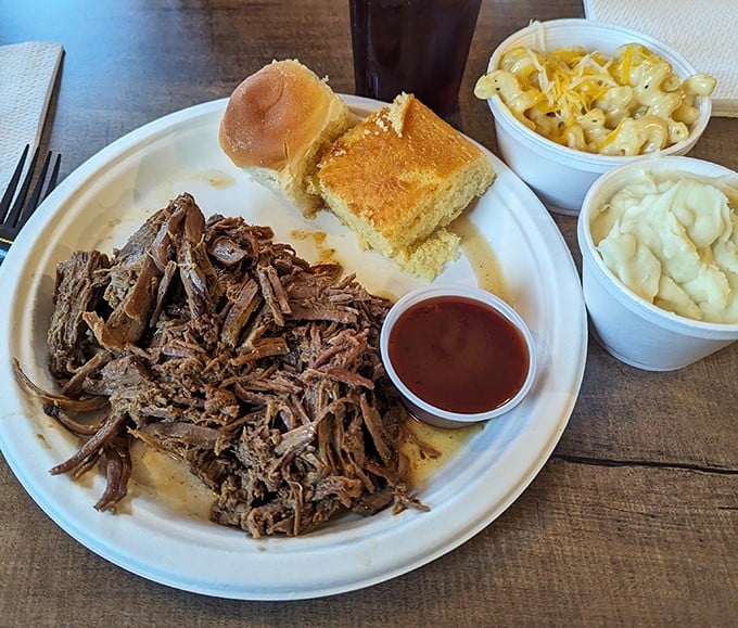 Pulled pork that doesn't just fall apart—it practically introduces itself to your taste buds with a handshake and a "pleased to meet you."