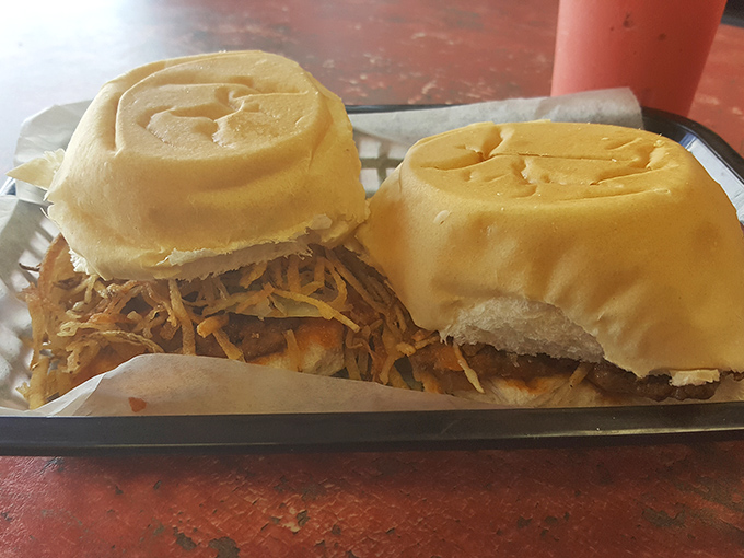 Two fritas side by side, like culinary twins showing off their potato-topped splendor. One is never enough—trust me on this.