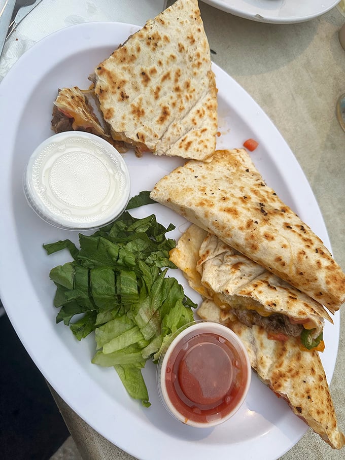 A quesadilla that doesn't skimp on the good stuff – where cheese meets tortilla in a relationship that was clearly meant to be.