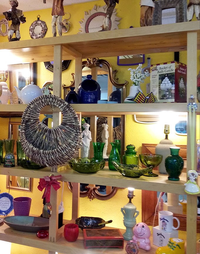 Green glass collectors, rejoice! This shelf is what happens when three generations of careful curation meet desert sunlight.