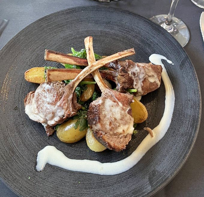 These lamb chops aren't just crossed on the plate – they're making a statement that elegant food doesn't have to be pretentious.