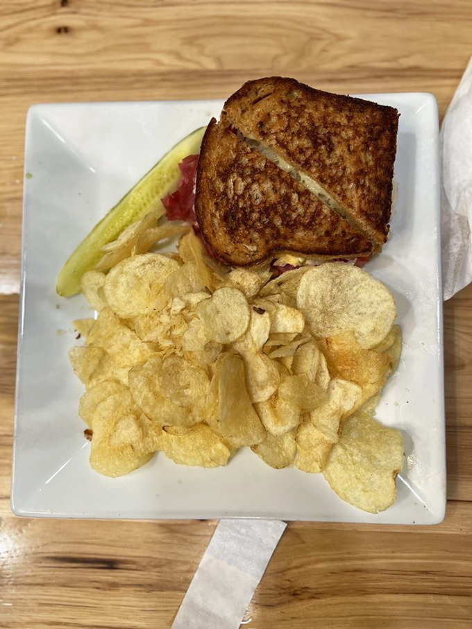 The sandwich that launched a thousand road trips. Golden, crispy bread giving way to that perfect corned beef-sauerkraut harmony.