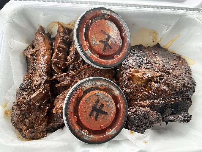 These ribs have achieved that perfect barbecue balance – a bark so beautiful it deserves its own art exhibition.